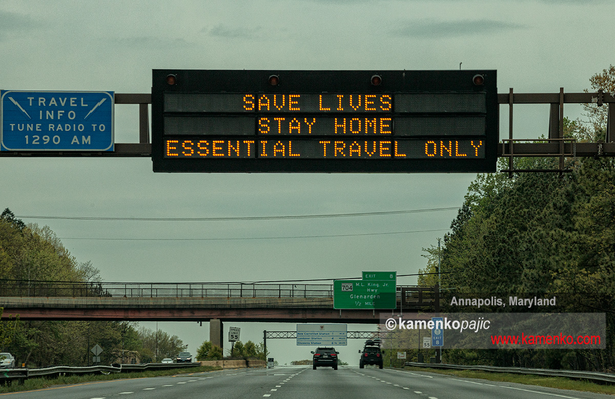 Vehicles pass a traffic message boards - Photographed by Kamenko ...